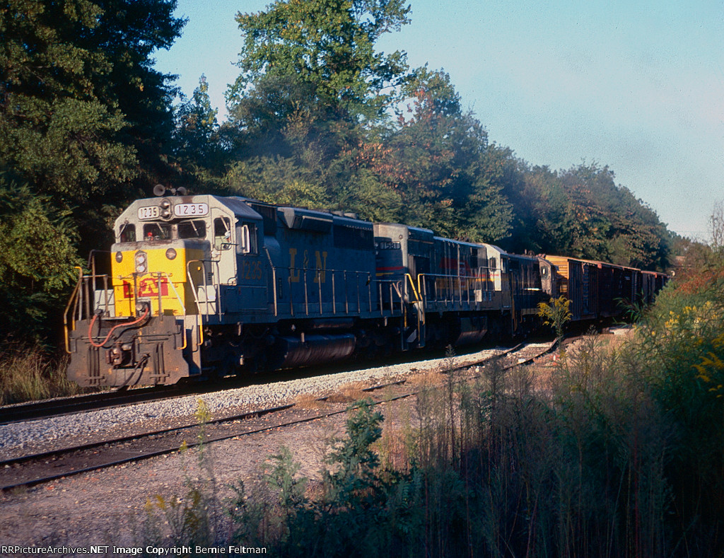 Louisville & Nashville SD40 #1235 and U30C #1581 lead Seaboard Coast Line train #308's extra ...